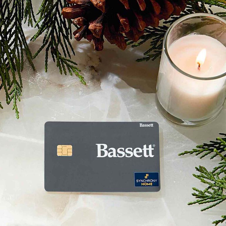 Bassett credit card with tea candle pine garnish